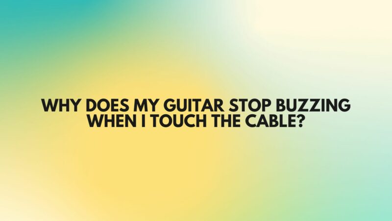 Why does my guitar stop buzzing when I touch the cable? - All For ...